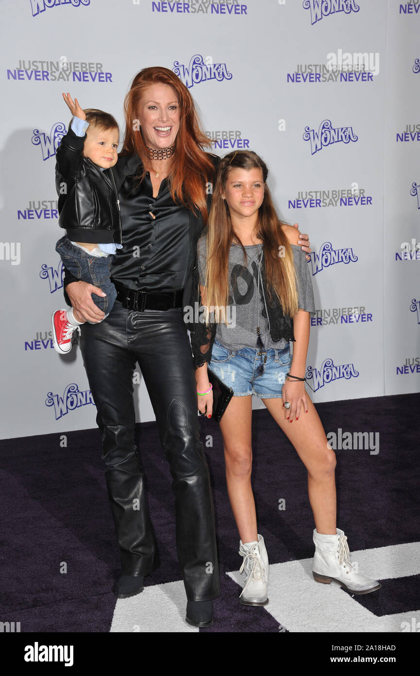 LOS ANGELES, CA. February 08, 2011: Angie Everhart & children at the ...