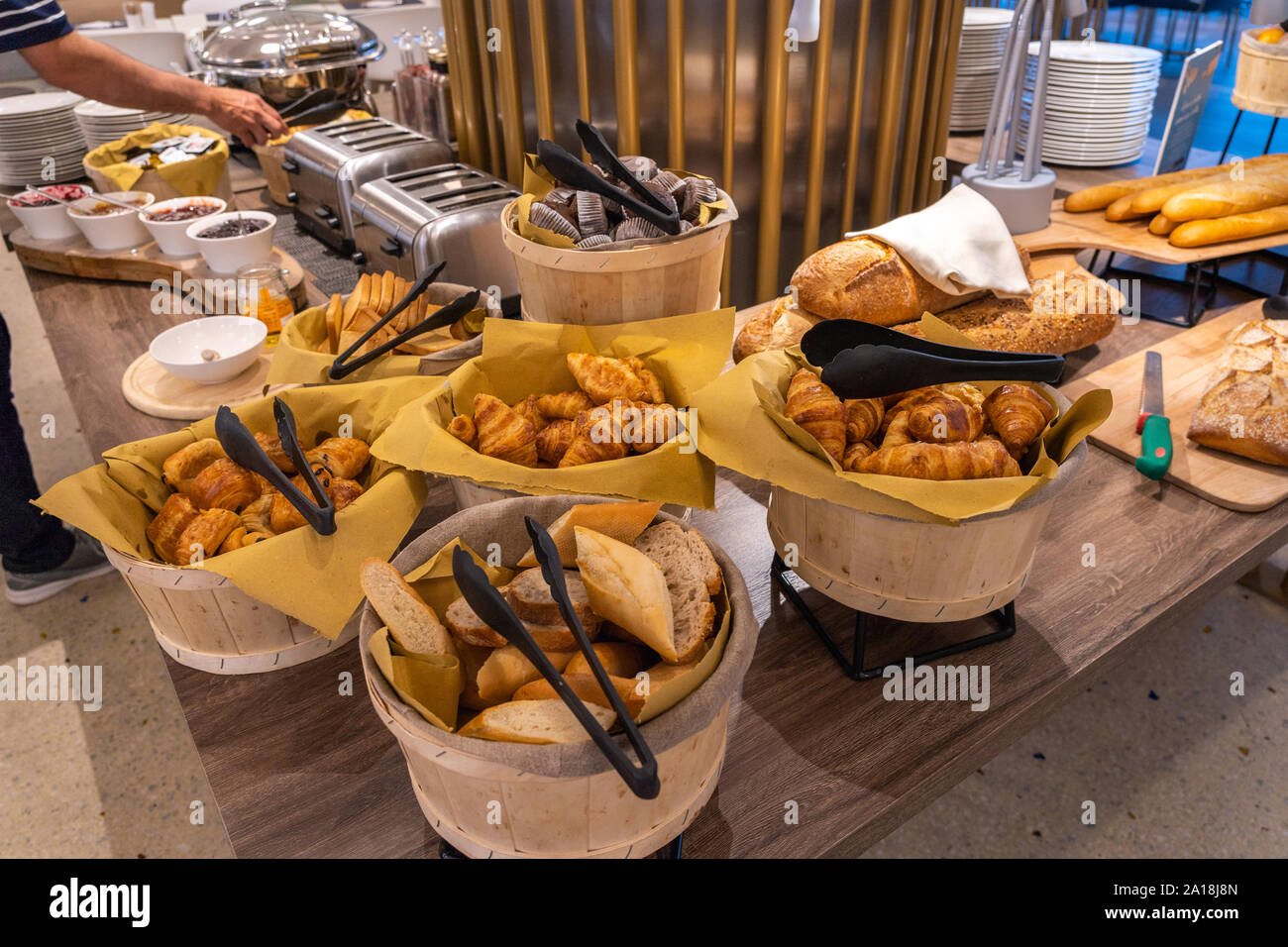 Baskets of croissants and breads in breakfast counter at hotel Stock ...