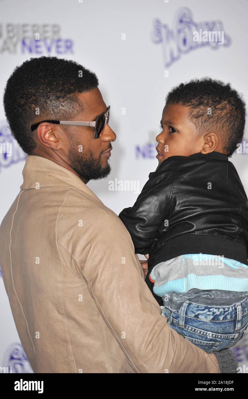 LOS ANGELES, CA. February 08, 2011: Usher & children at the Los Angeles ...
