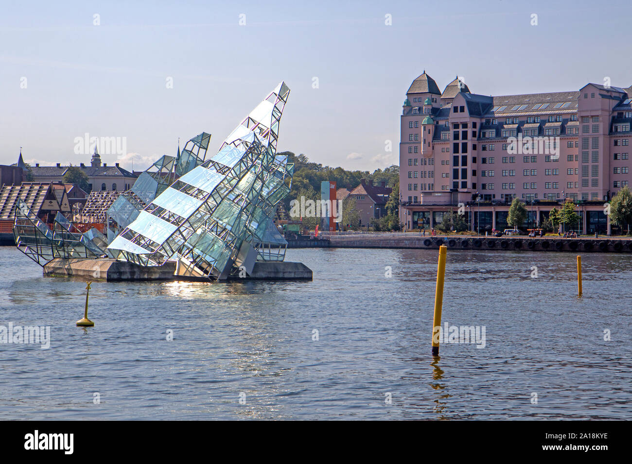 The She Lies glass iceberg sculpture beside the Opera House in Oslo ...