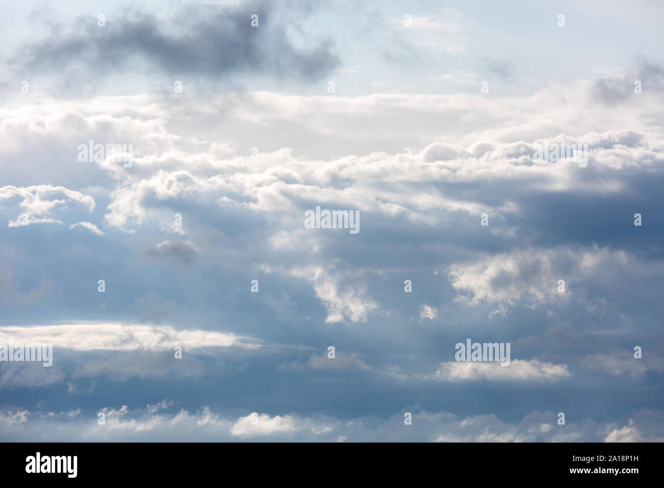 Thick beautiful clouds and clouds in the sky. Cloudy weather before the ...