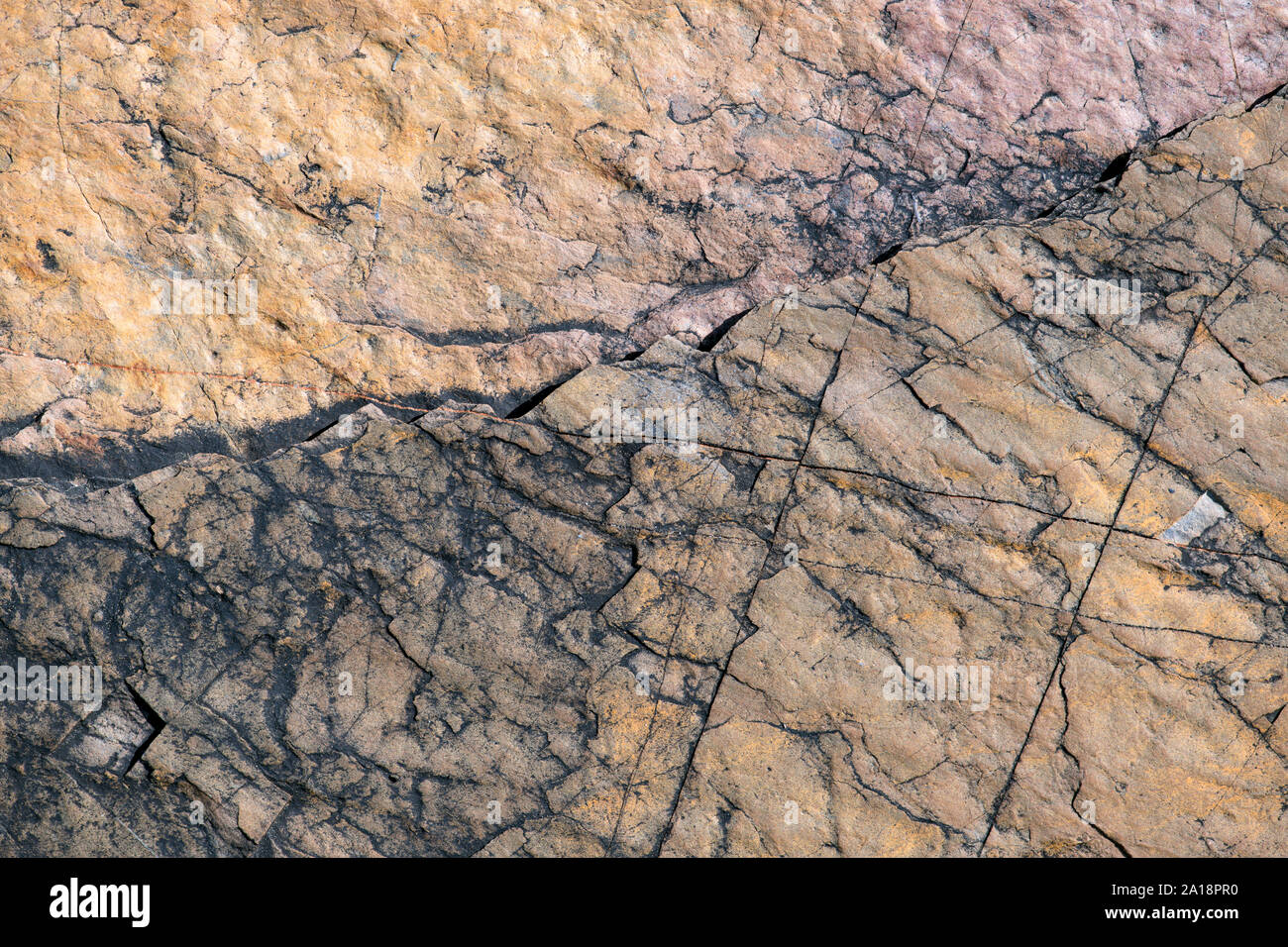 Rock surface detail with crosshatch crack lines Stock Photo - Alamy
