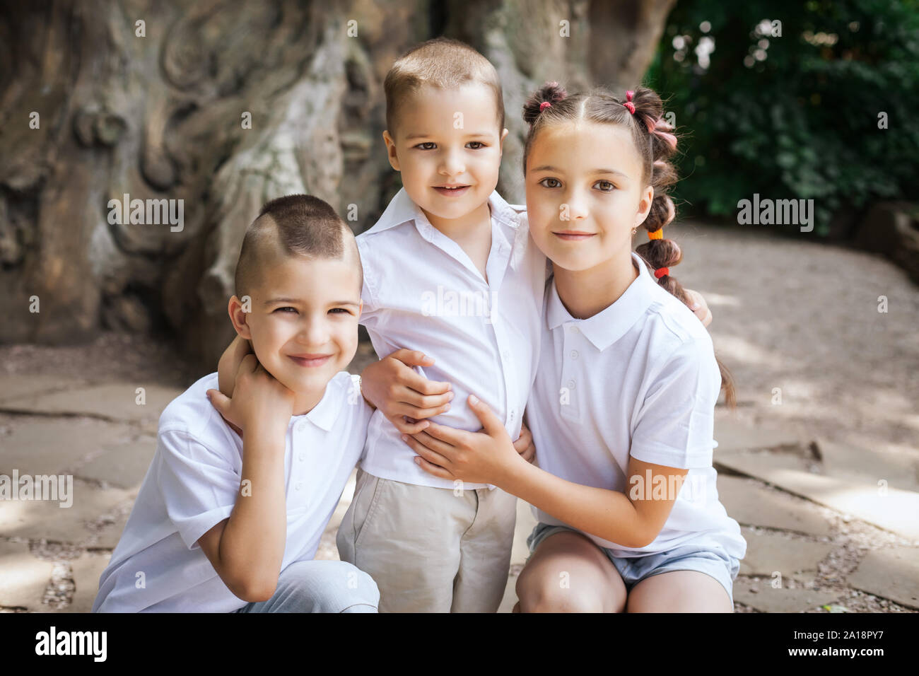 adorable embracing children Stock Photo - Alamy