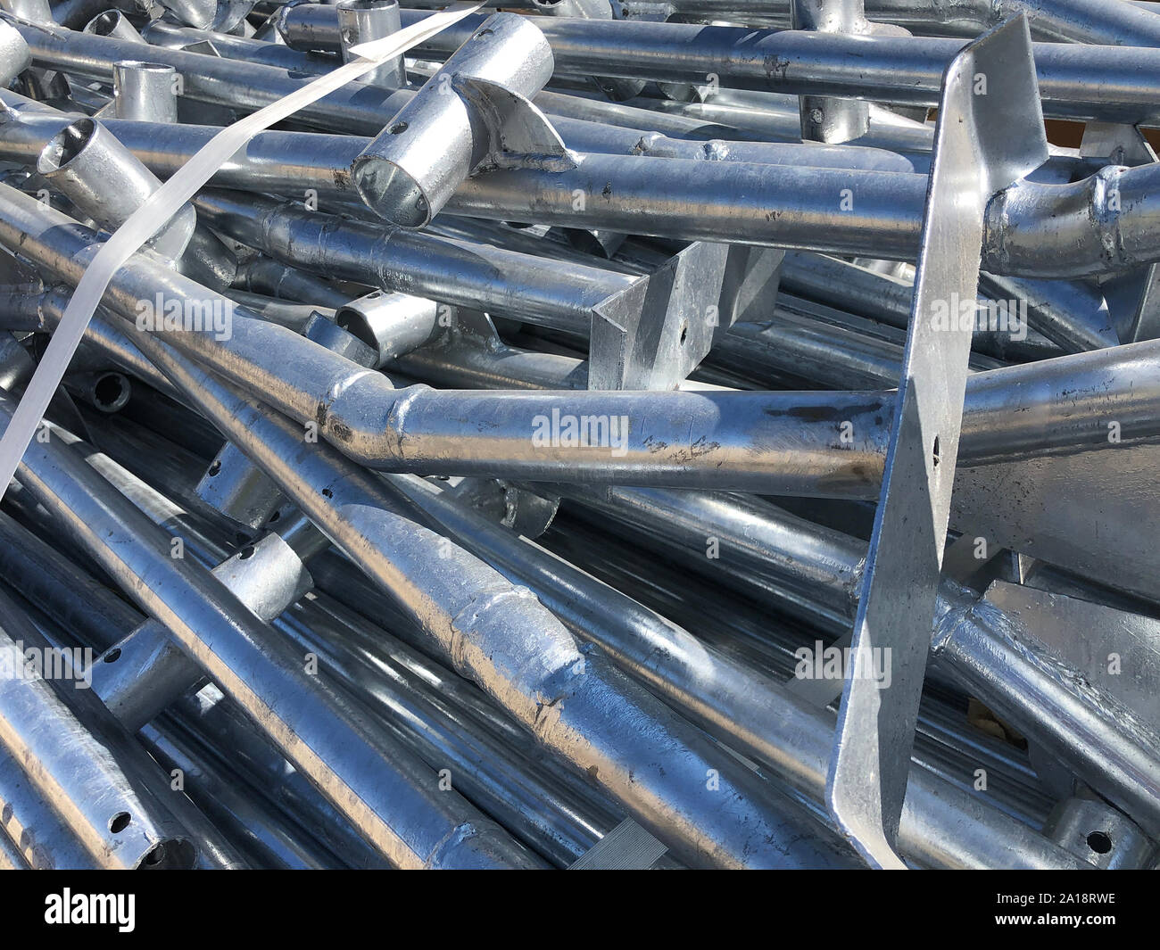 Chrome plated formwork supporting metal pipes in the box on the outdoor ...