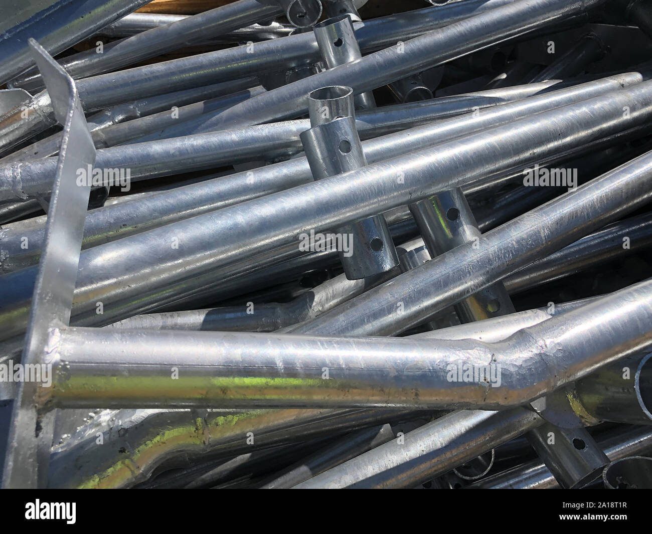 Chrome plated formwork supporting metal pipes in the box on the outdoor ...