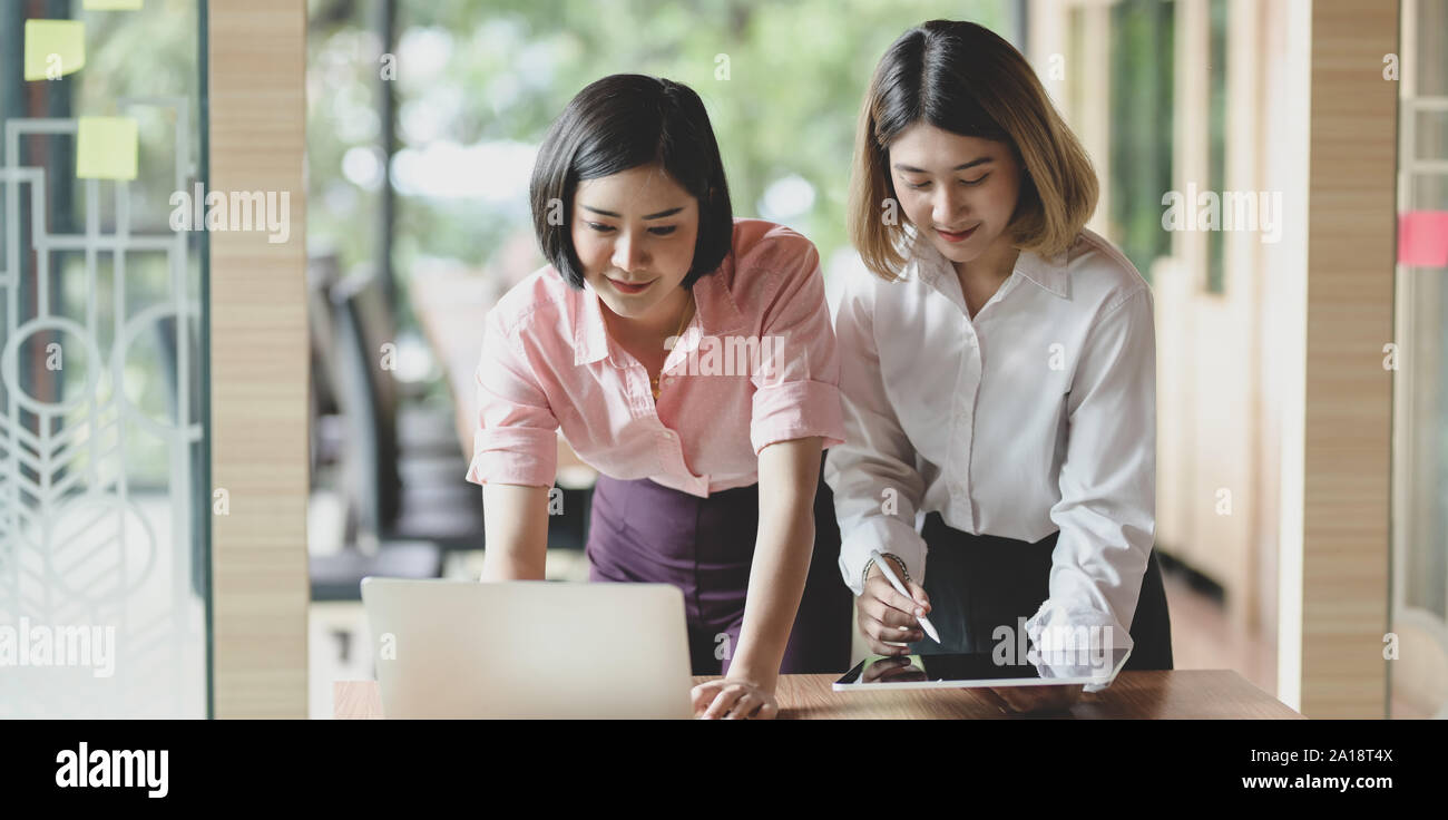 Successful UI web designer team working on their upcoming smartphone ...