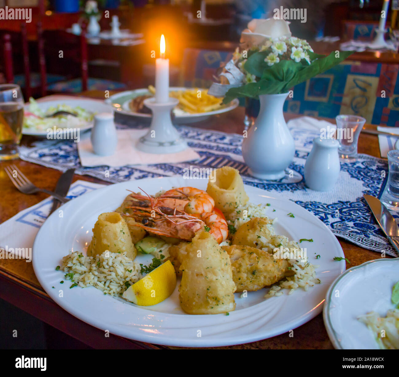 Mediterranean food on the table, Grilled seafood Stock Photo - Alamy