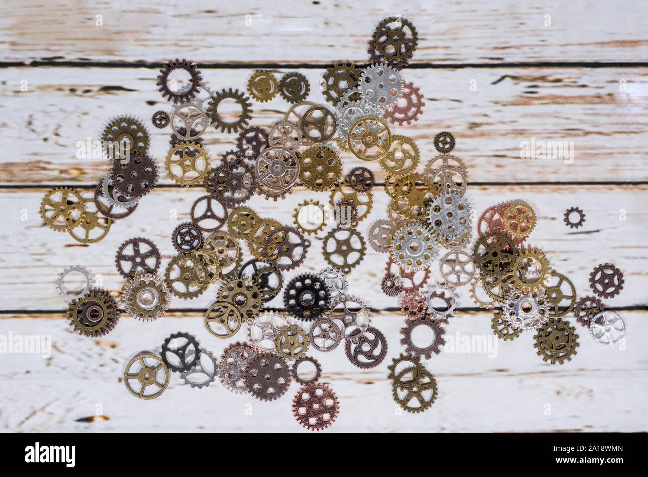 Clock gear wheels on table. Retro clock repairing abstract photo Stock ...