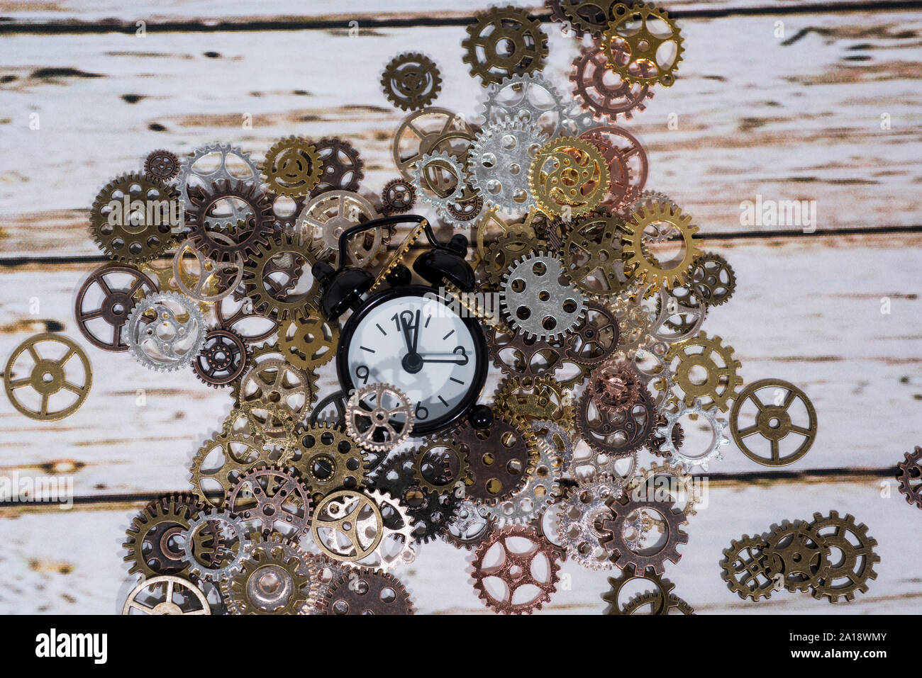 Clock gear wheels on table. Retro clock repairing abstract photo Stock ...