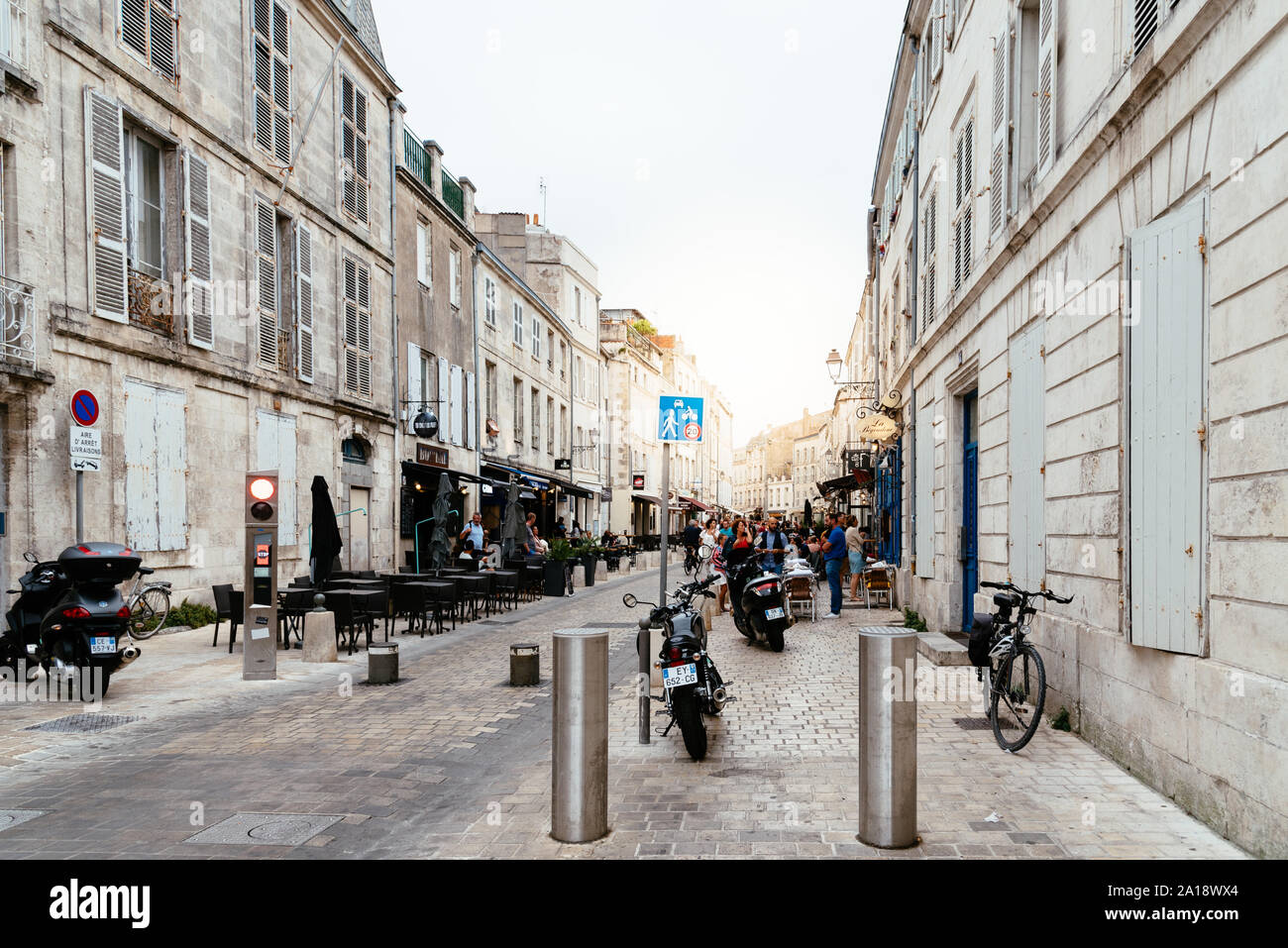 La Rochelle, France - August 7, 2018: People at busy street with ...