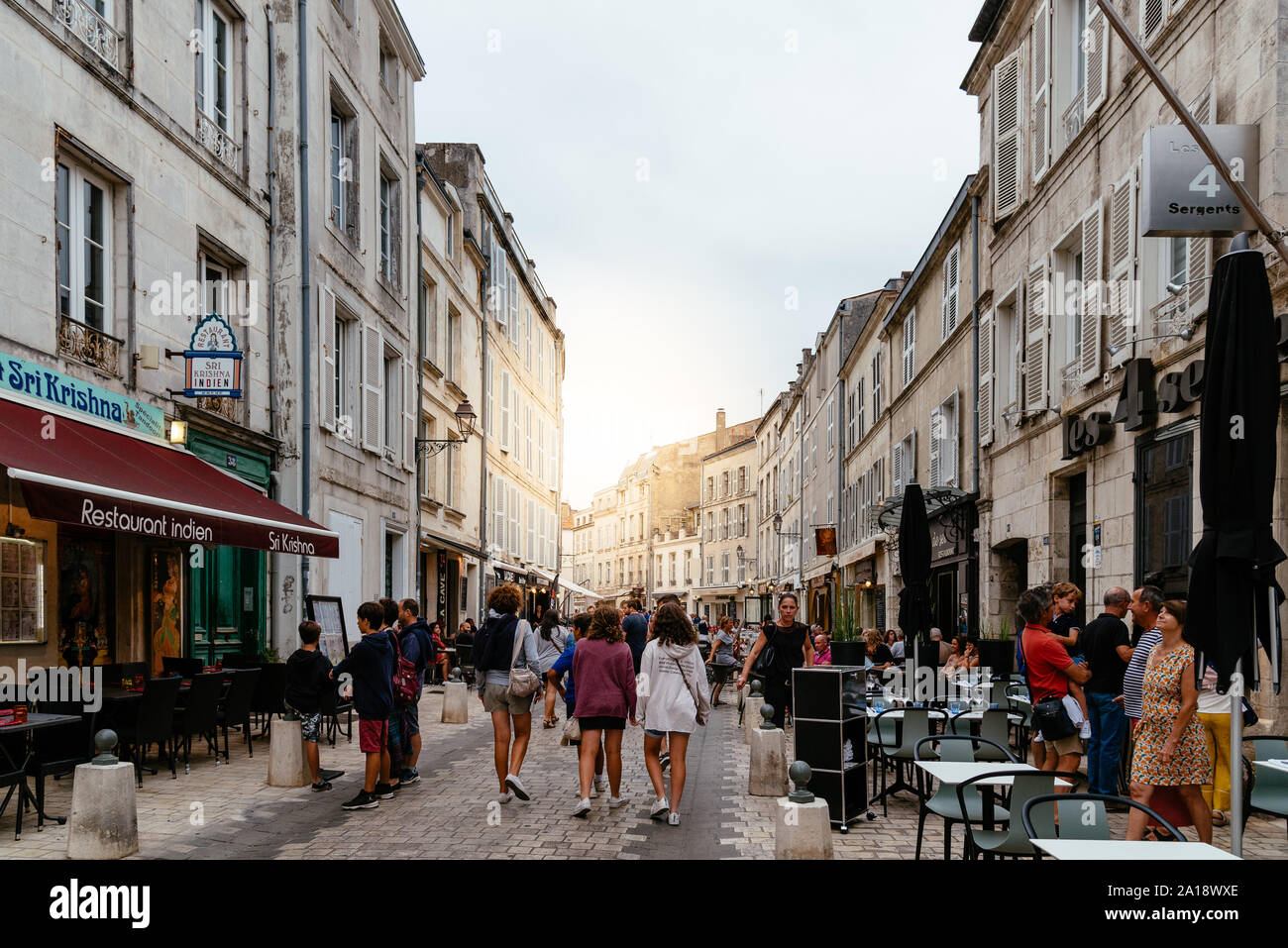 La Rochelle, France - August 7, 2018: People at busy street with ...