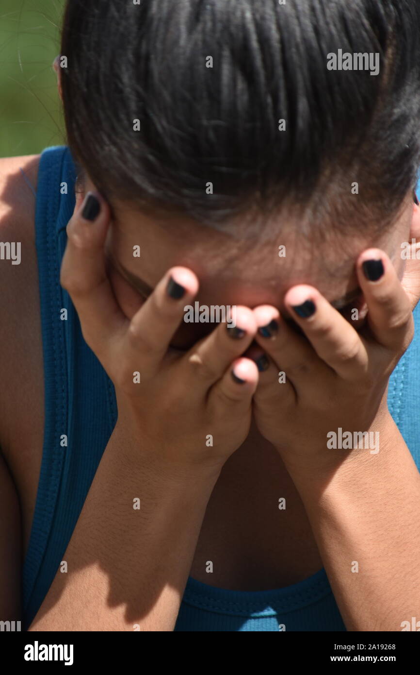Beautiful sad female filipino hi-res stock photography and images - Alamy