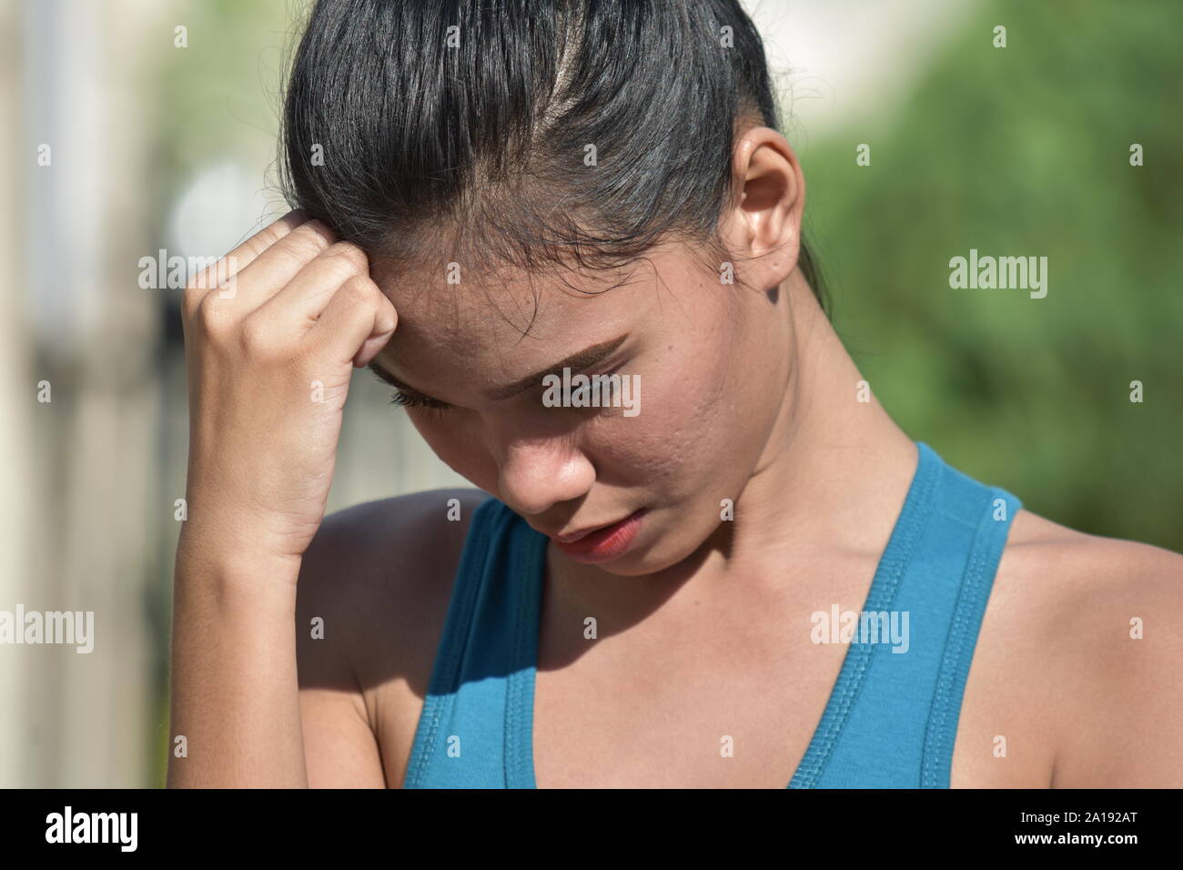 Beautiful sad female filipino hi-res stock photography and images - Alamy