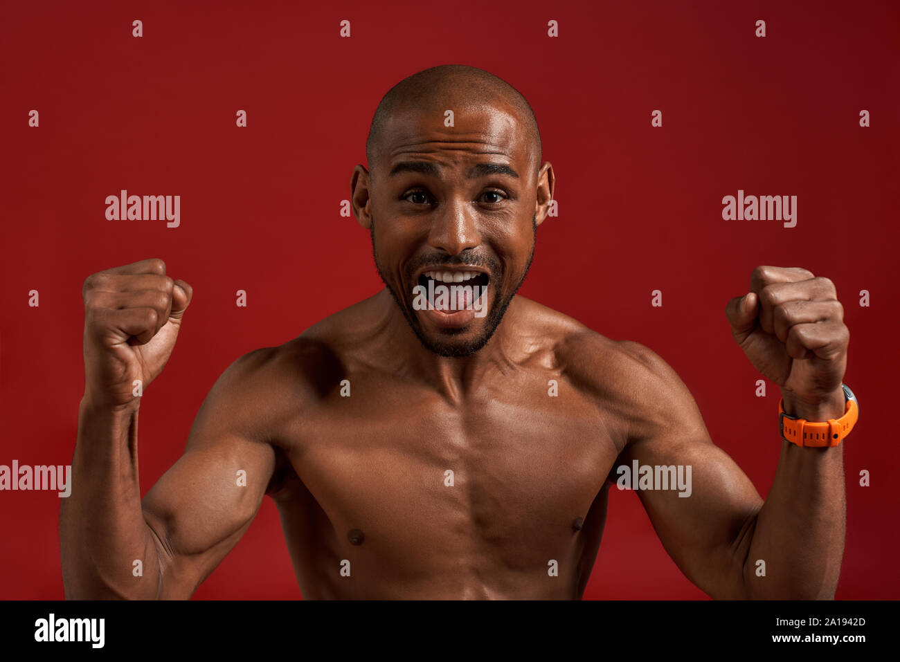 Happy sportsman. Close up portrait of happy african man screaming at ...