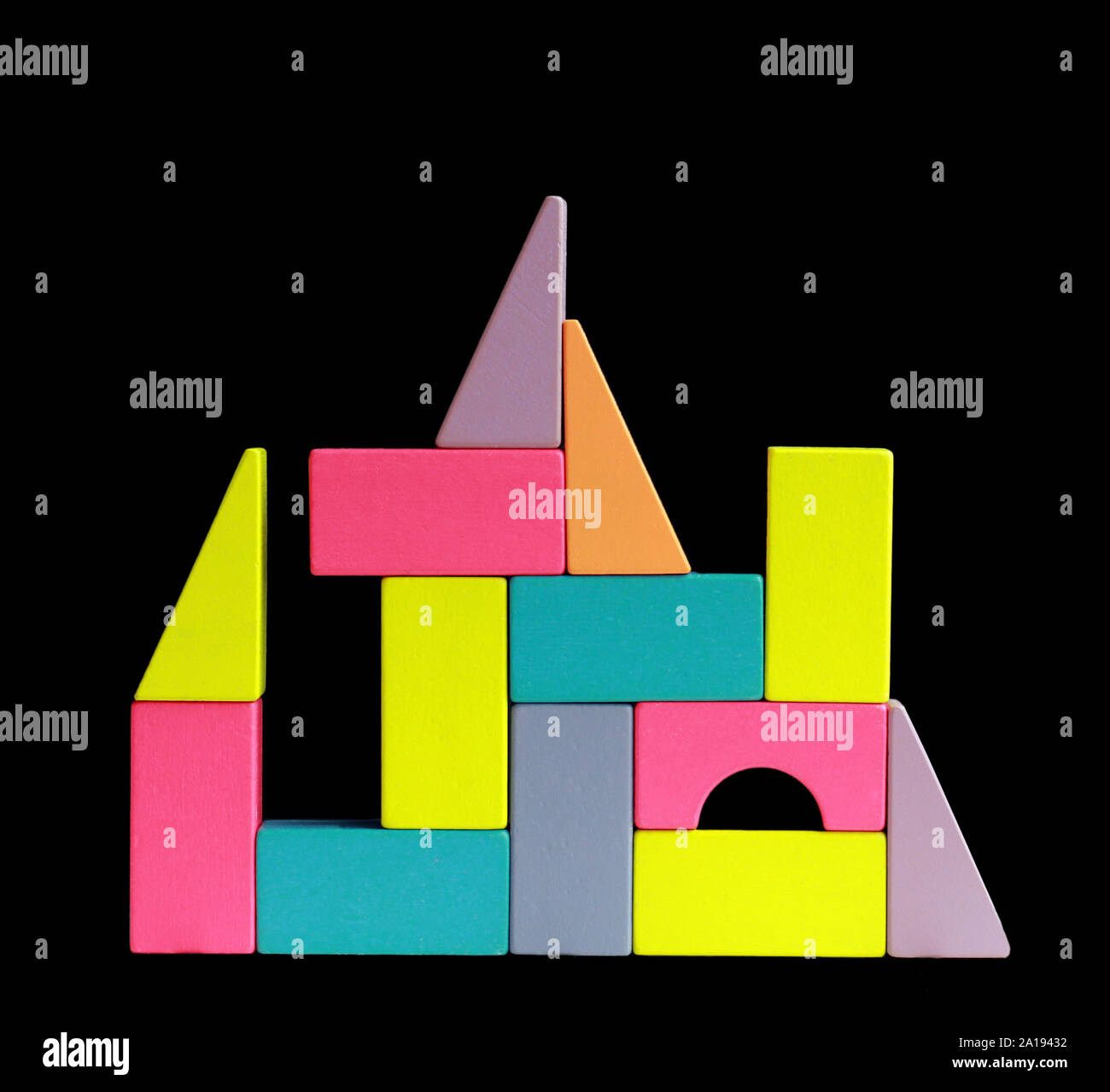 Imaginary construction of colorful wooden blocks over dark background ...