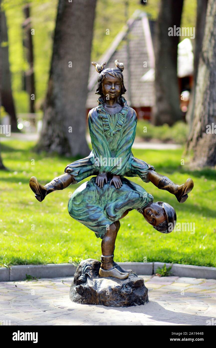 Children statue game hi-res stock photography and images - Alamy