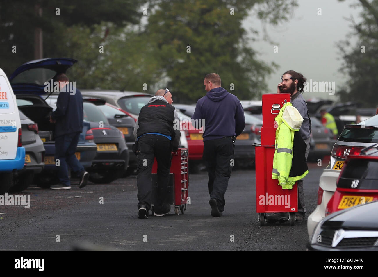 Workers leave the Wrightbus Chassis plant in Antrim, Northern Ireland ...