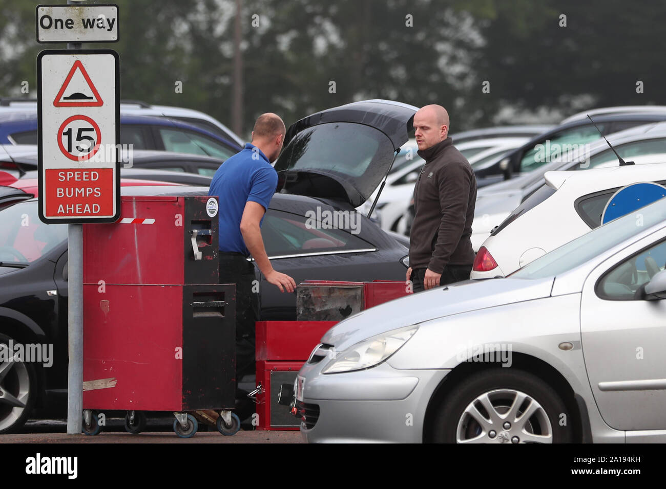 Workers leave the Wrightbus Chassis plant in Antrim, Northern Ireland ...