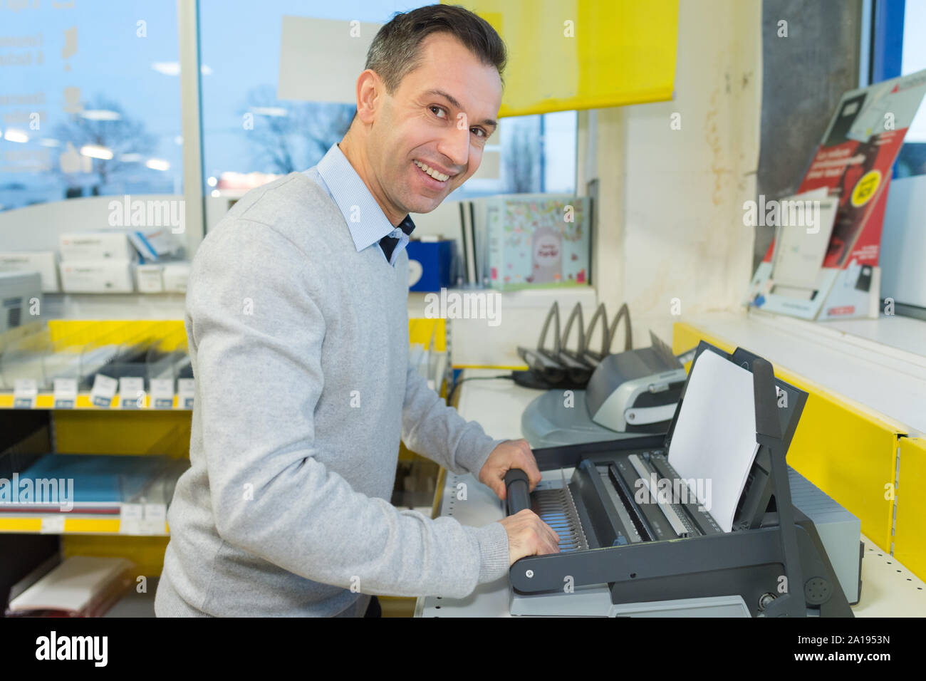 man posing in the office shop Stock Photo - Alamy