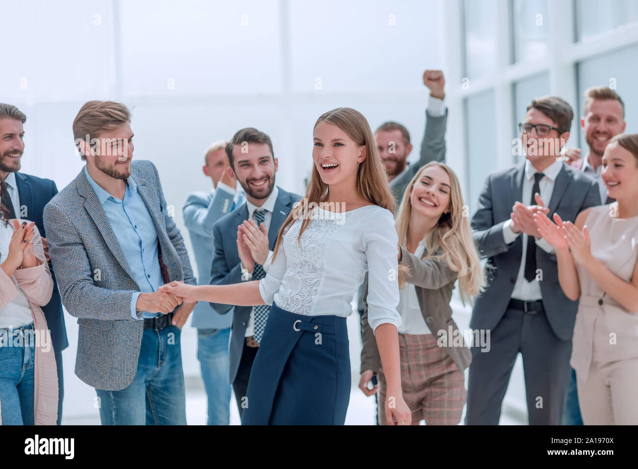 professional business team congratulating their leader. photo with ...