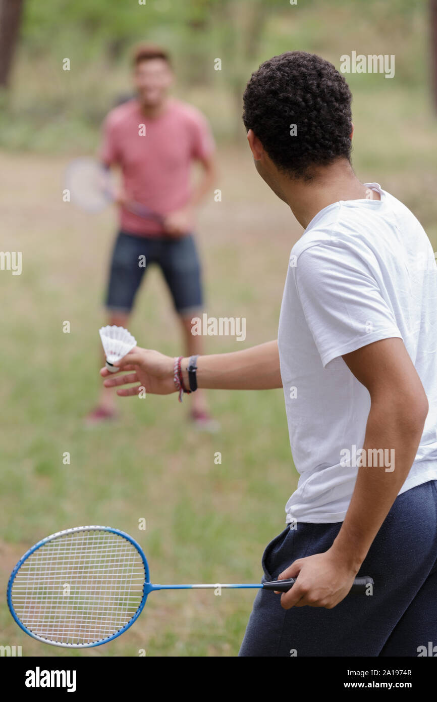 adult man playing badminton with his father Stock Photo - Alamy