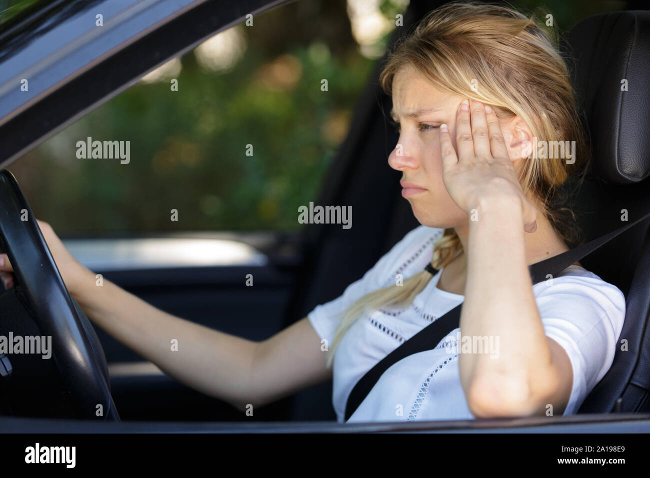 depressed female driver stuck in traffic jam Stock Photo - Alamy