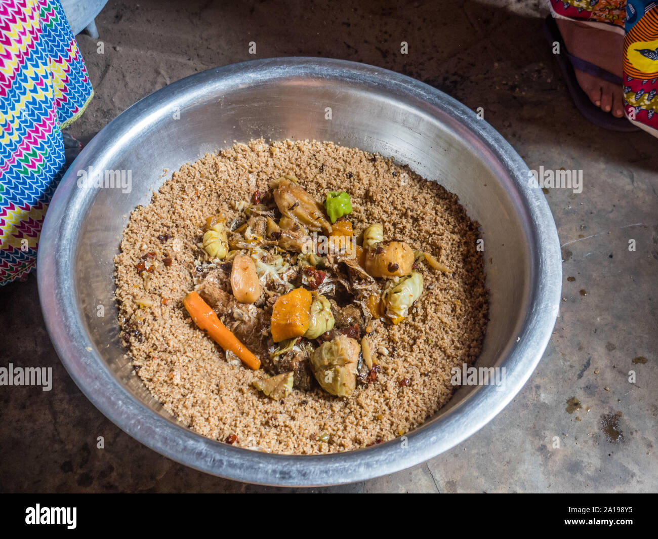 Typical senegalese food - 'Thiéboudieune' waiting for the family to be ...
