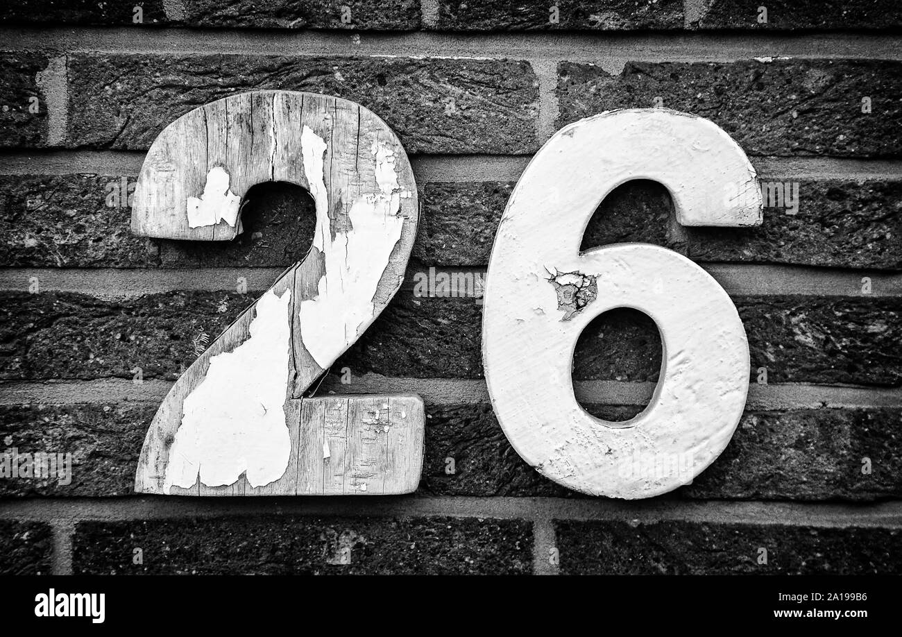 Number twenty six on the wall of a house Black and White Stock Photos ...