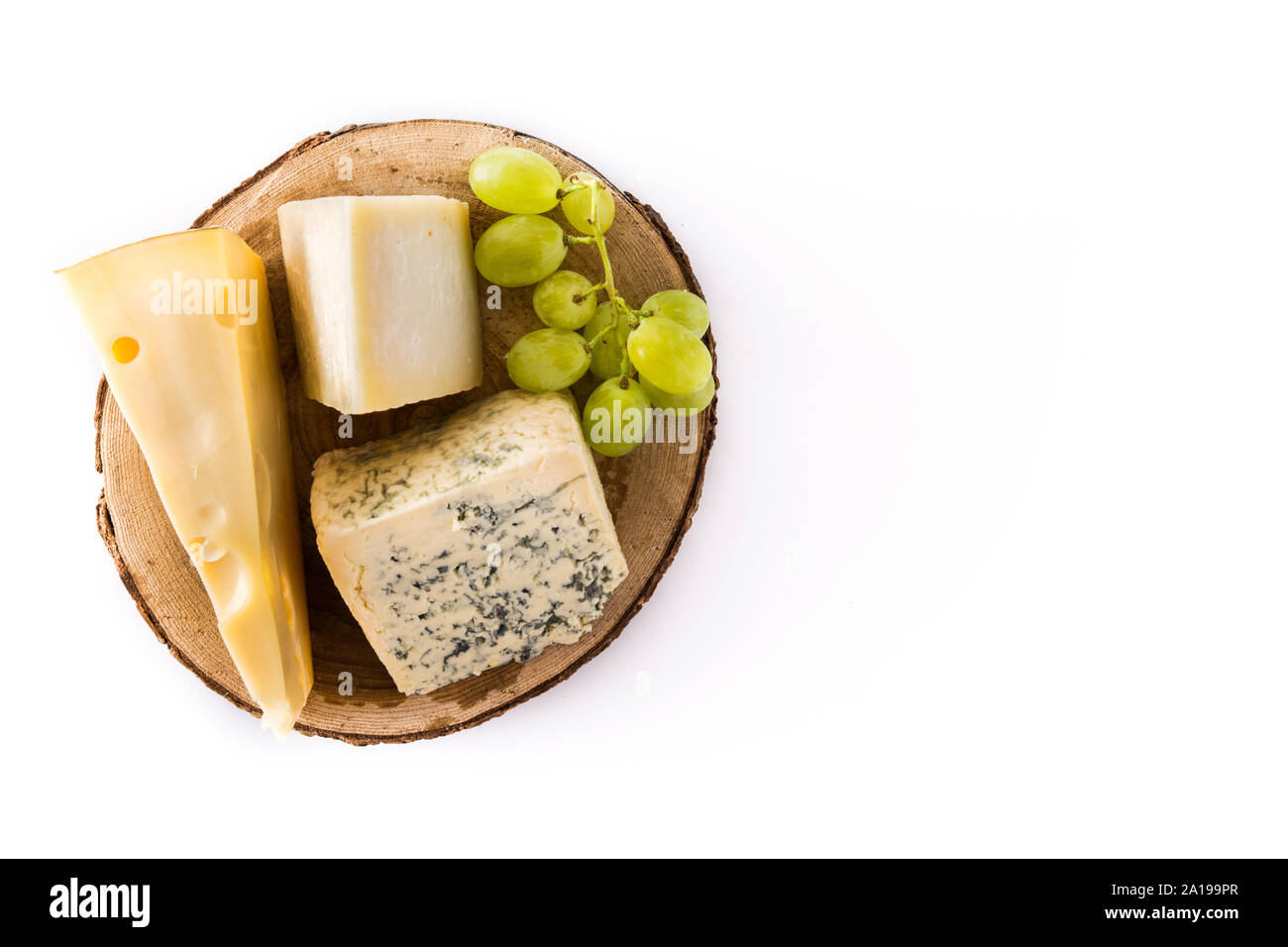 Different types of cheeses and green grapes isolated on white ...