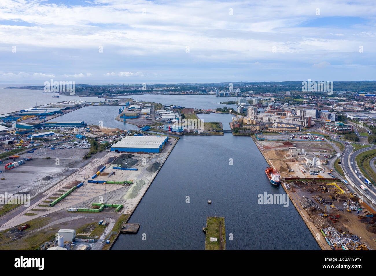 Aerial view of the industrial side of the Cardiff bay / docks, Wales UK ...