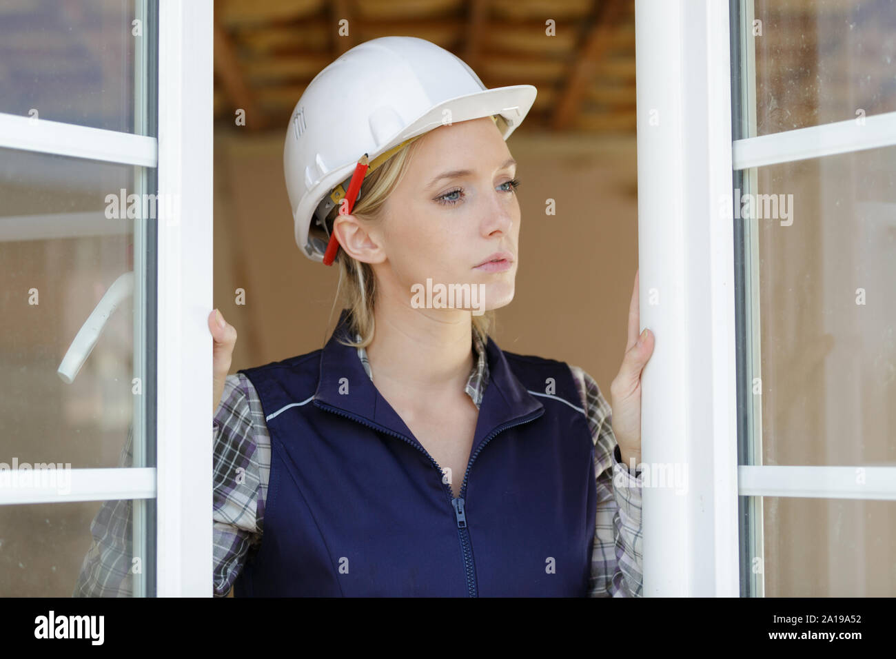 Woman double glazing hi-res stock photography and images - Alamy