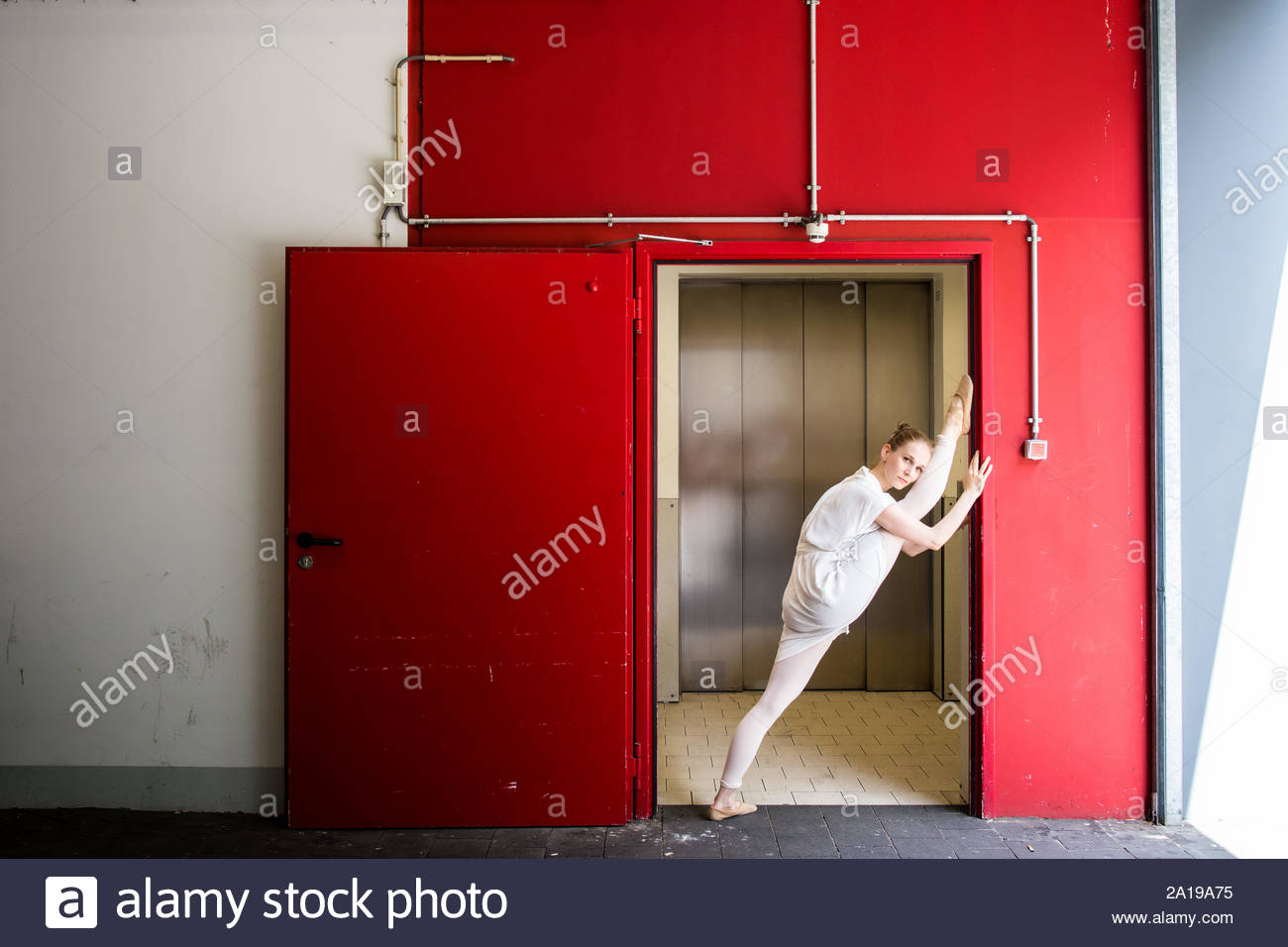 Woman Red Dress Door High Resolution Stock Photography and Images - Alamy