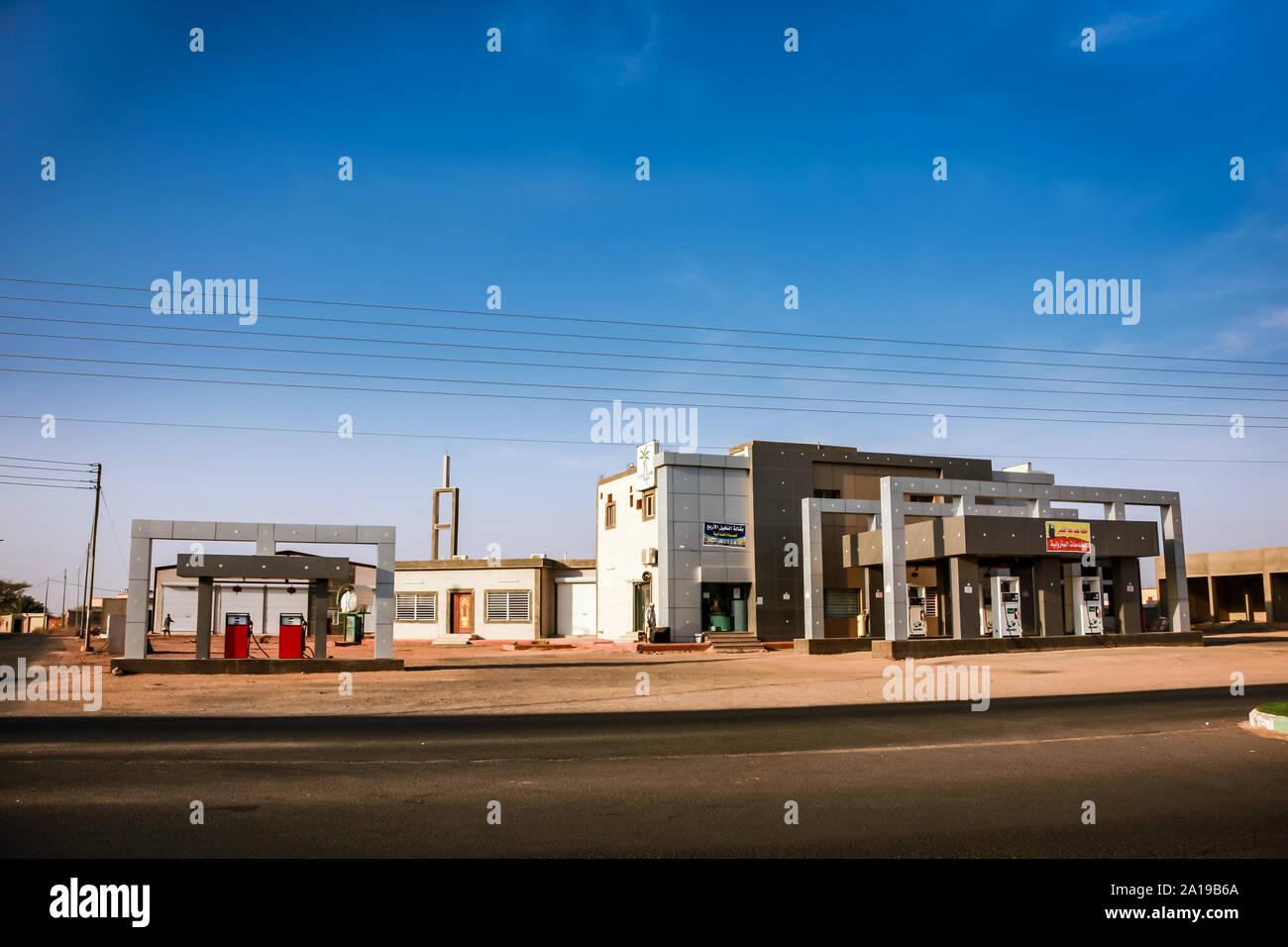 A petrol station and a mosque near the town border, Umm Aldoom, Saudi ...