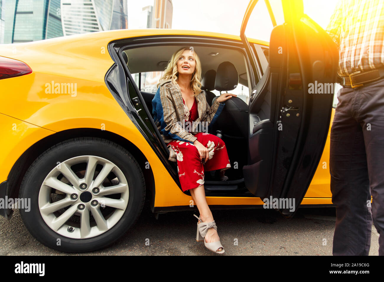 Rear view yellow taxi cab hi-res stock photography and images - Alamy