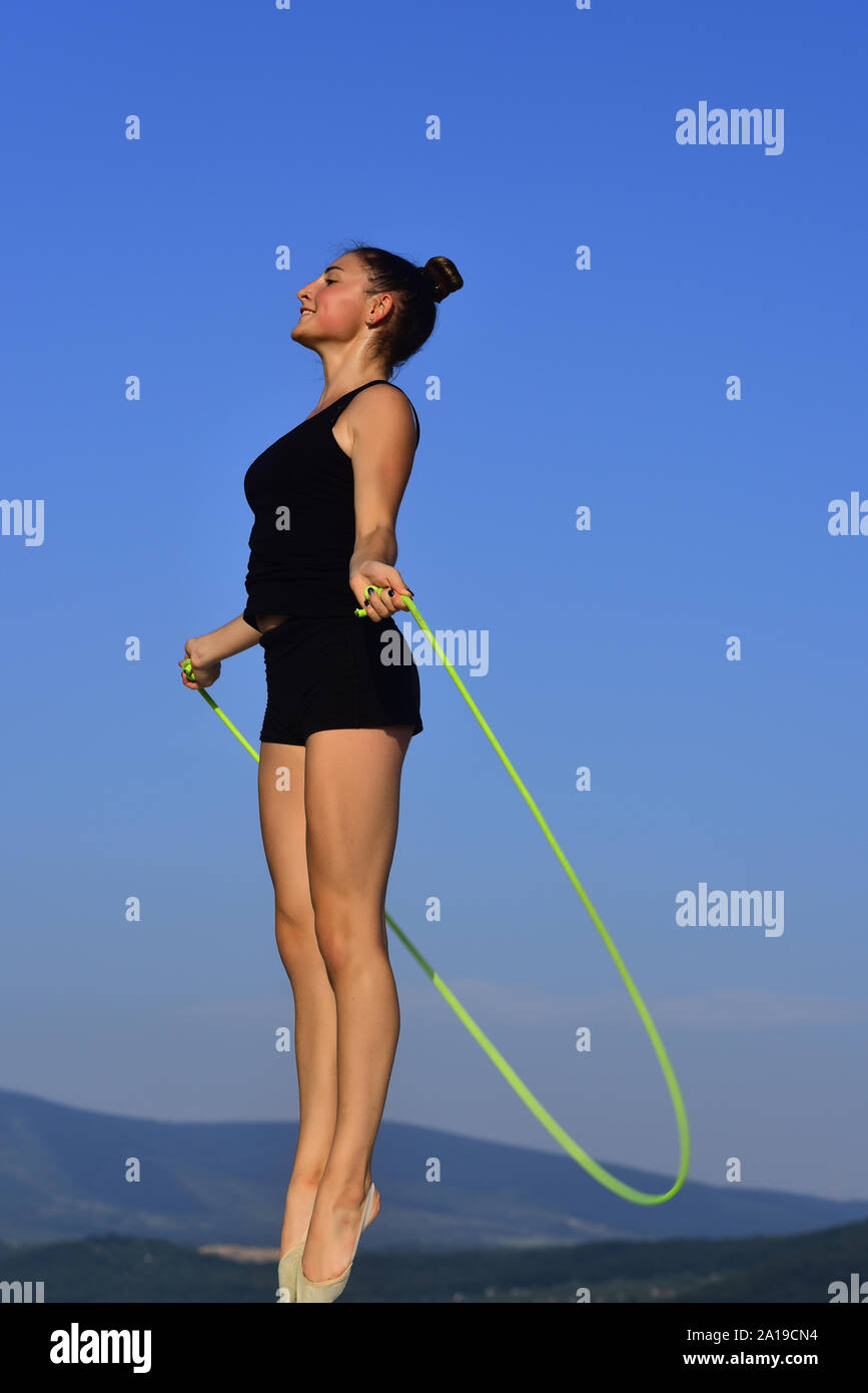 Energetic fitness girl jumping skipping hi-res stock photography and ...