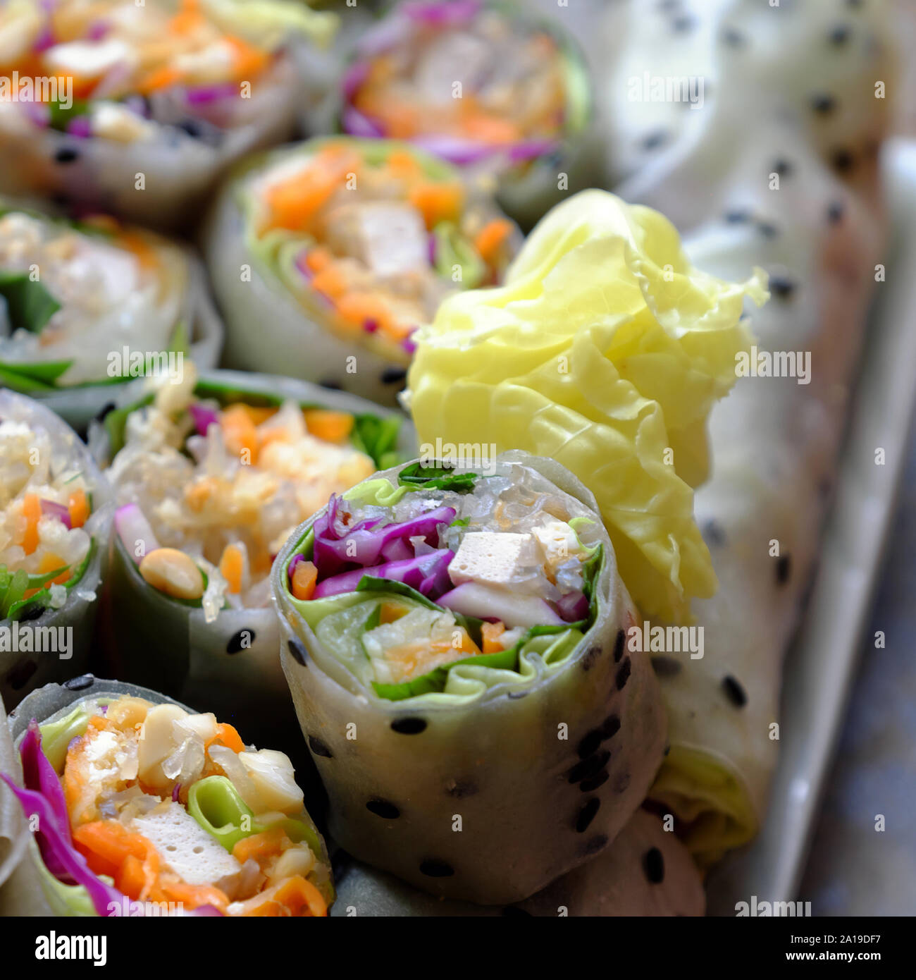 Close up sliced vegan rice paper rolls and Vietnamese spring roll ...