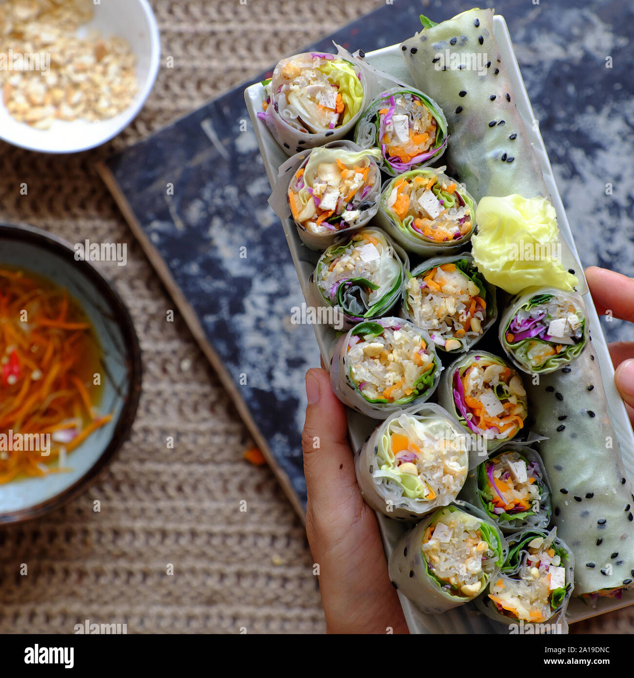 Close up sliced vegan rice paper rolls on Vietnamese spring roll ...