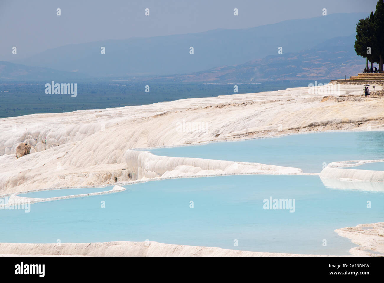 Natural ponds with teal water in the landmark Pamukkale in Turkey Stock ...