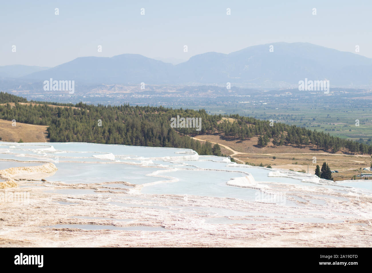 Natural ponds with teal water in the landmark Pamukkale in Turkey Stock ...