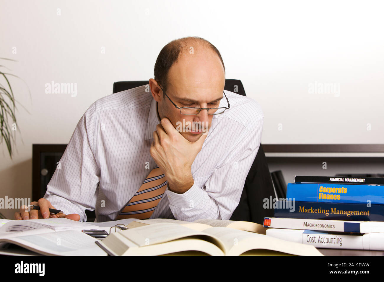 Professional stack books reading hi-res stock photography and images ...
