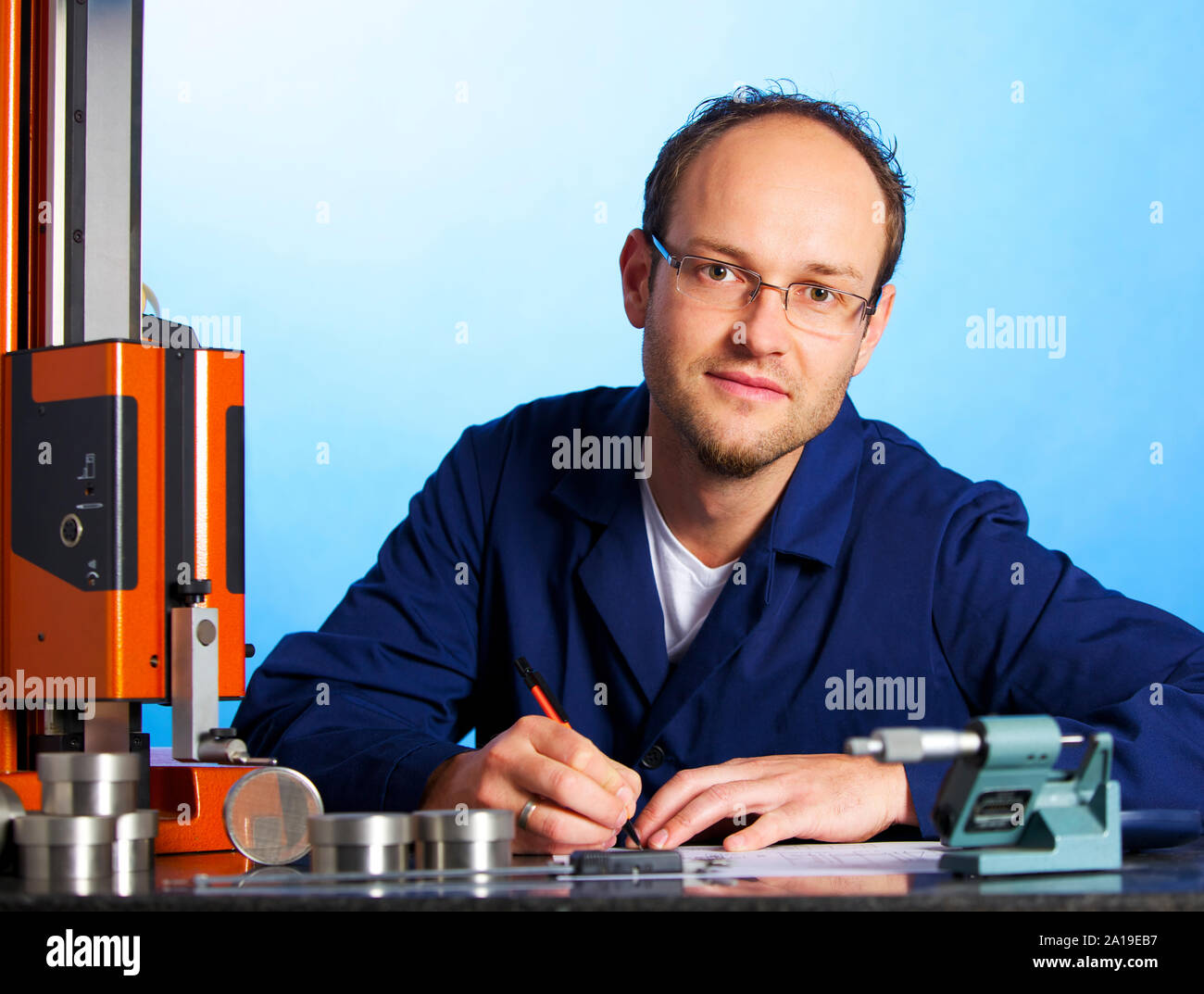 Engineer recording measurement data Stock Photo - Alamy