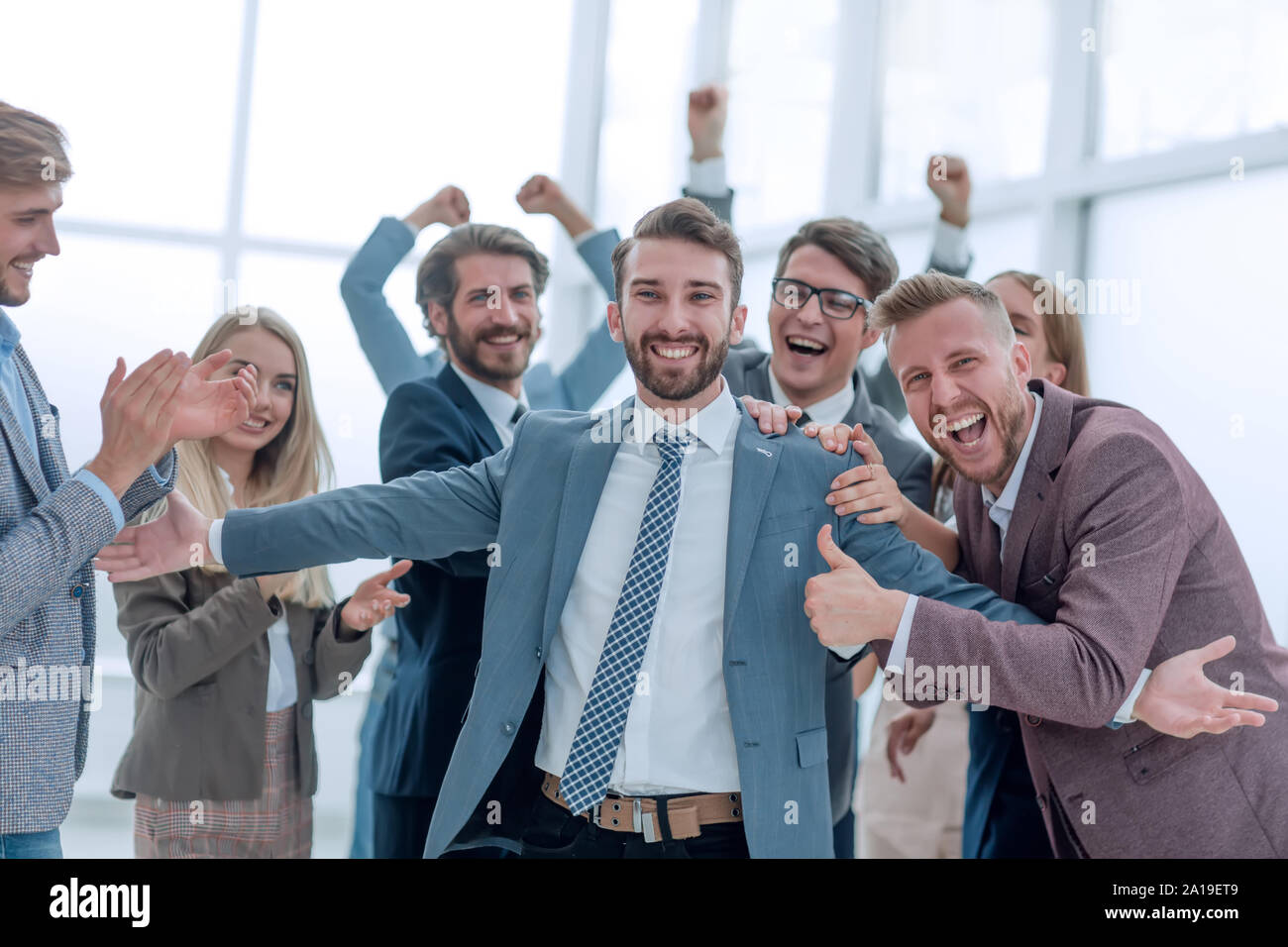 Team hugging hi-res stock photography and images - Alamy