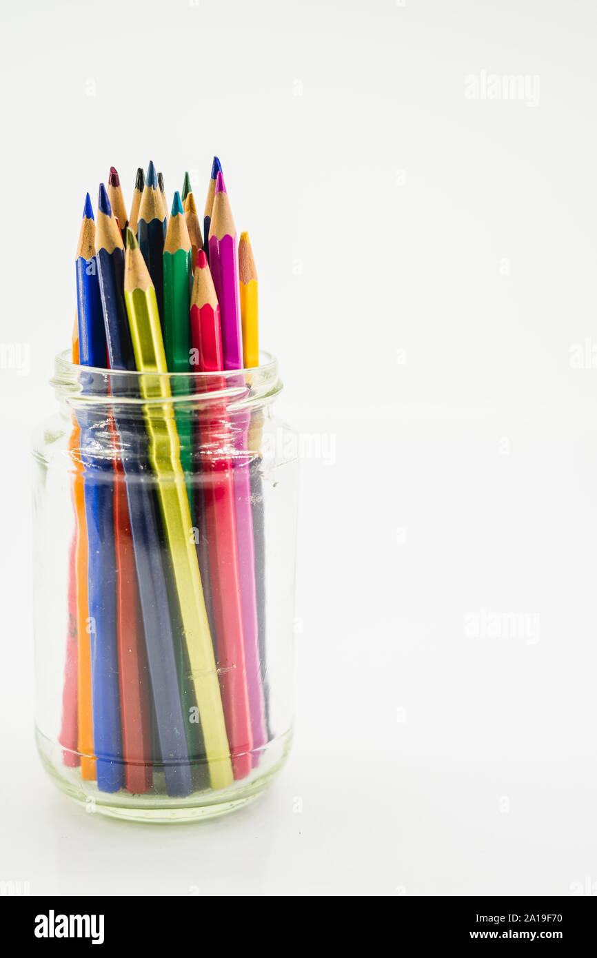 Collection of colored pencils in a jar Stock Photo - Alamy