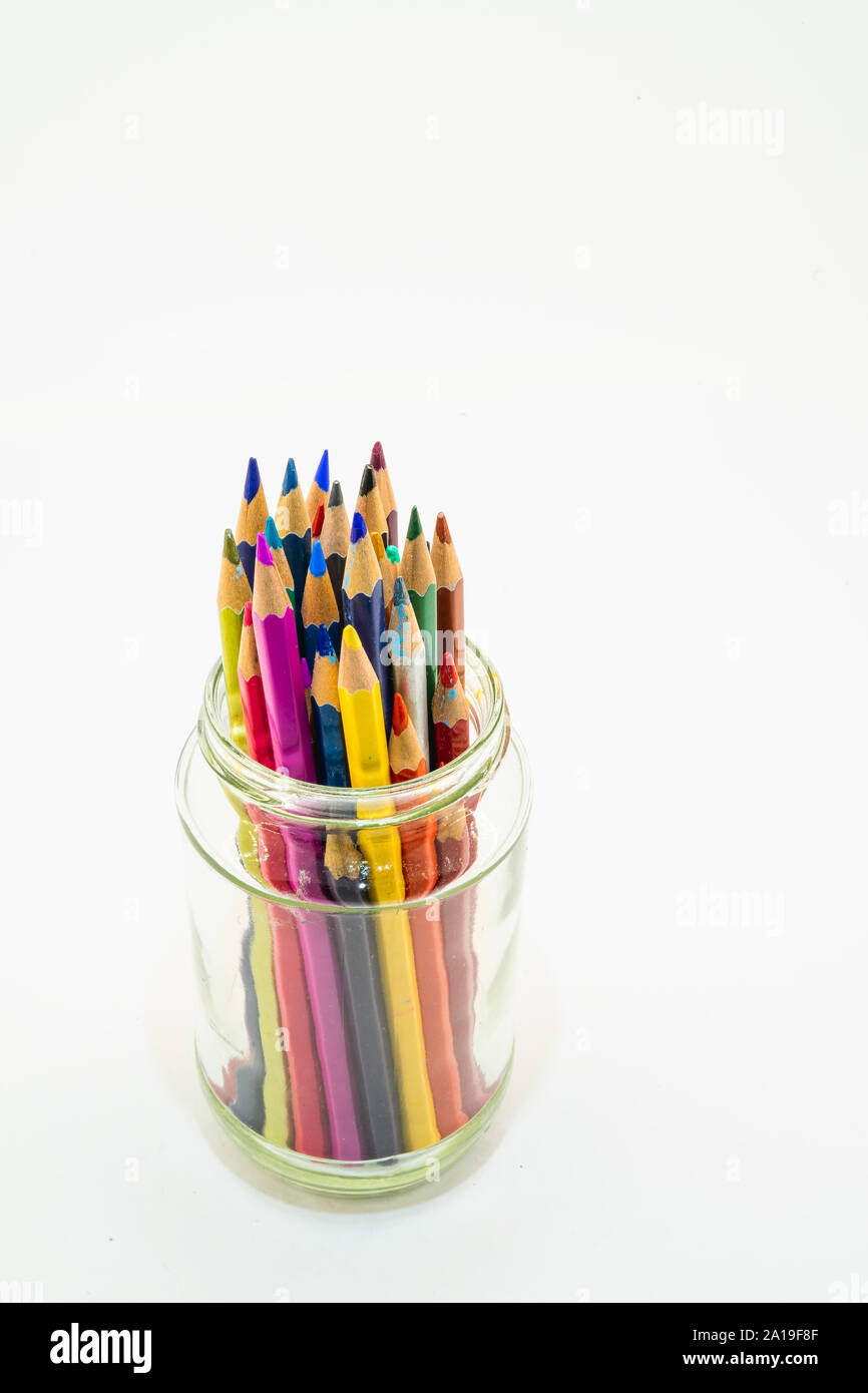 Collection of colored pencils in a jar Stock Photo - Alamy