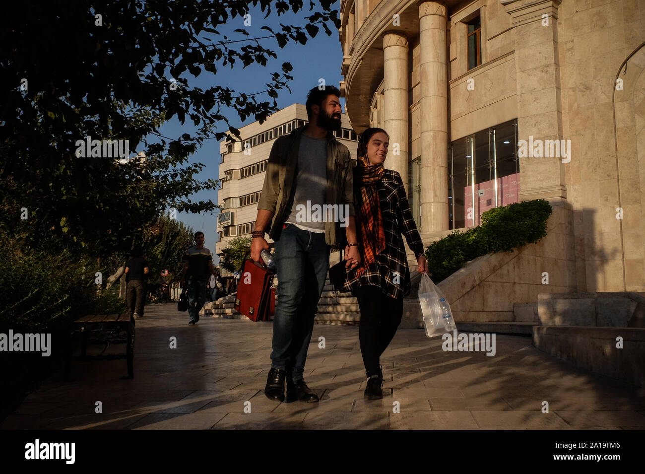 Tehran, Iran. 24th Sep, 2019. People walk in Tehran, Iran. Credit ...
