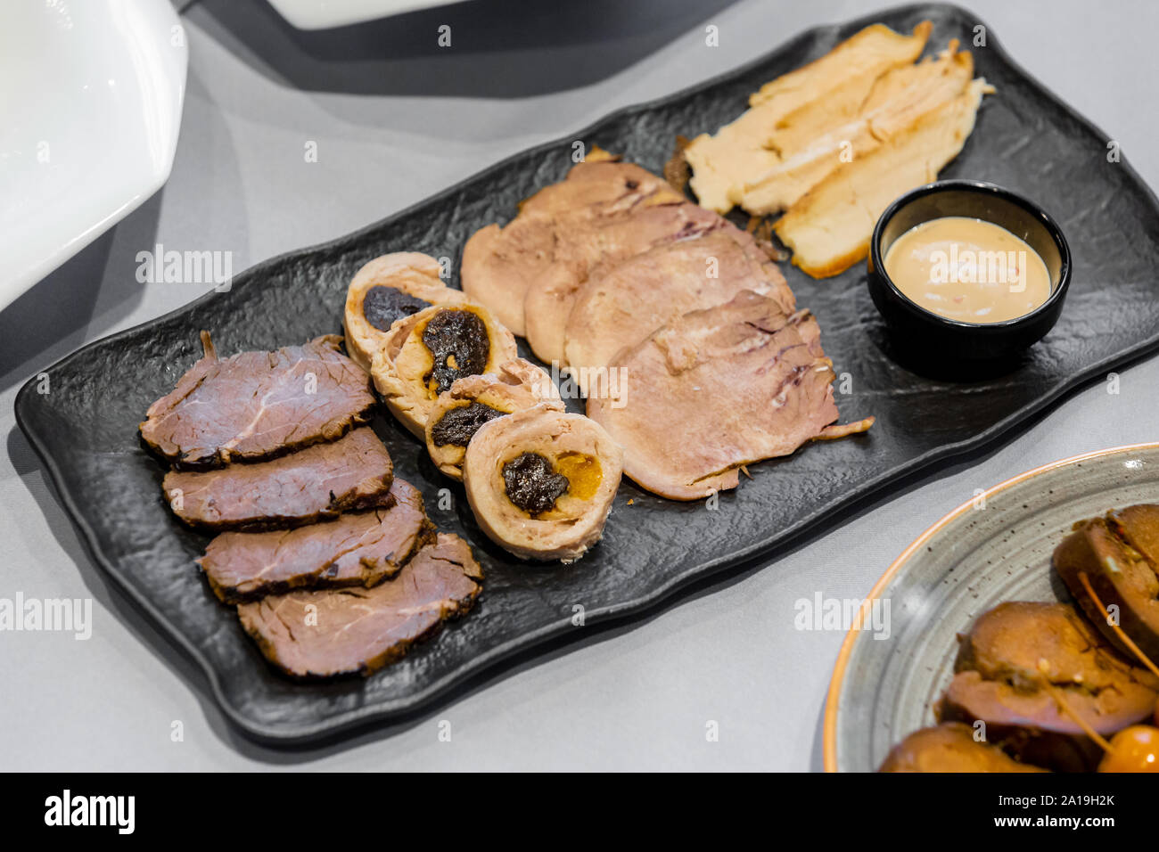 Beef and roulets on tray Stock Photo - Alamy