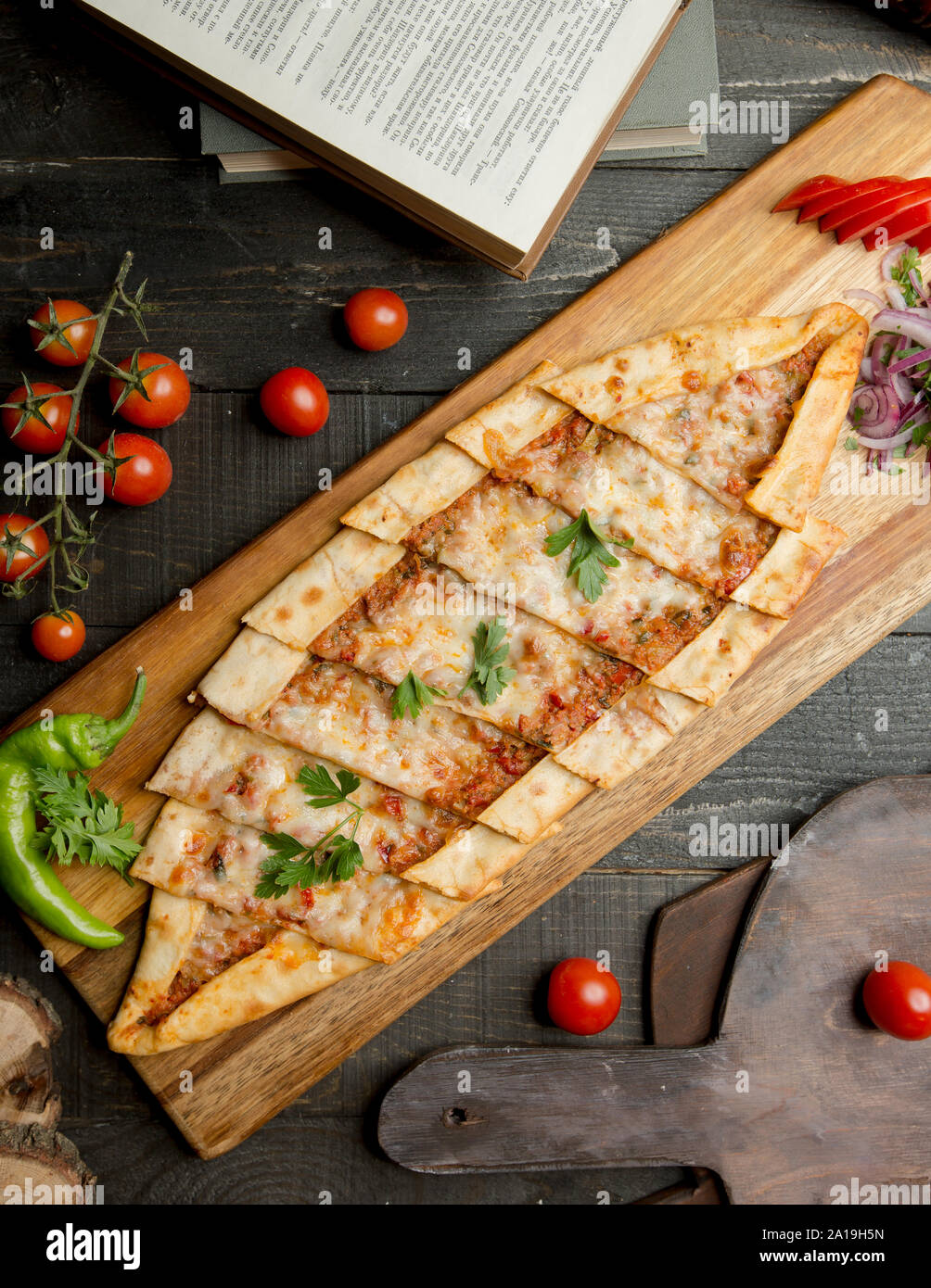 Turkish pide with meat and cheese Stock Photo - Alamy