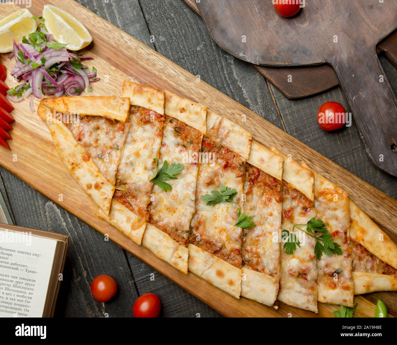 Turkish pide with meat and cheese Stock Photo - Alamy