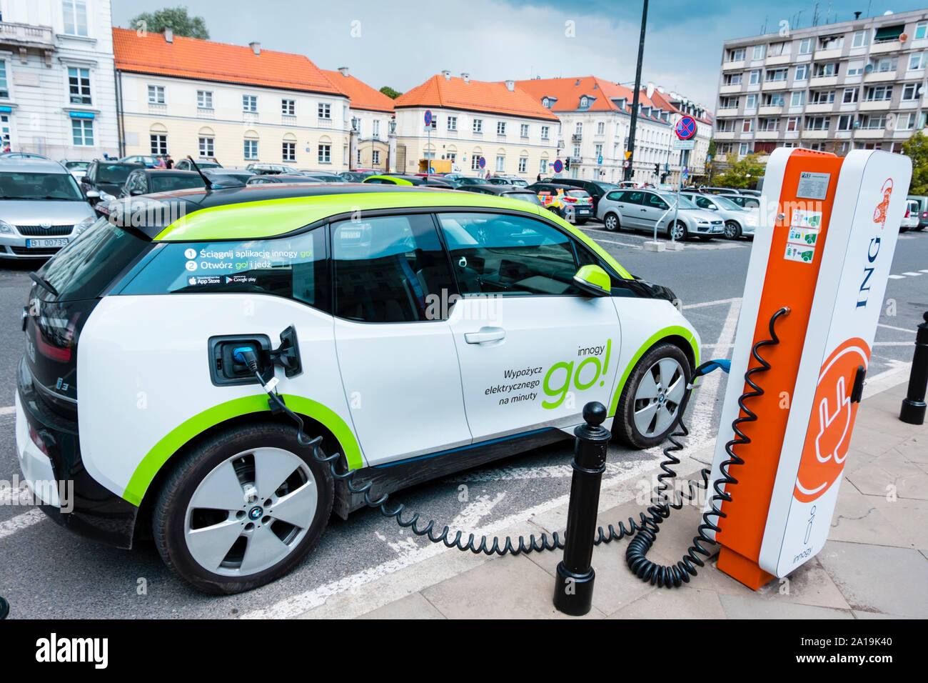 Electric car is being charged hi-res stock photography and images - Alamy