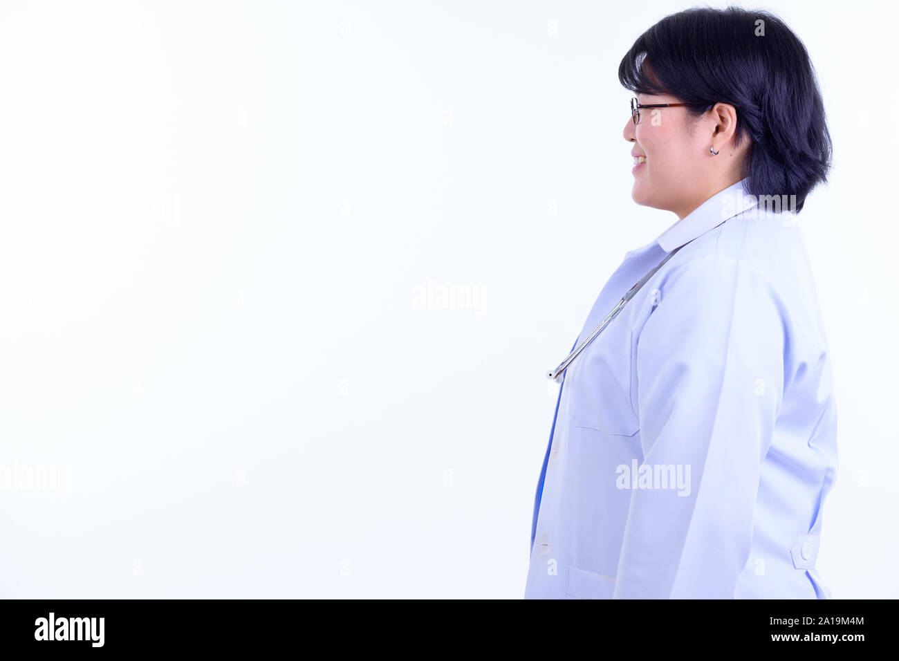Happy overweight asian woman doctor hi-res stock photography and images ...